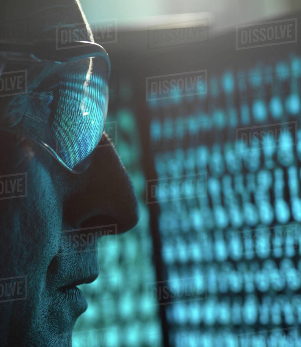 Cyber Security, Man looking at computer screen which is being infected ...