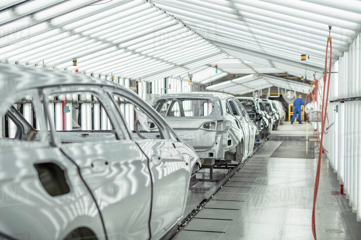 Car bodies in paint inspection area in car factory - Stock Photo - Dissolve