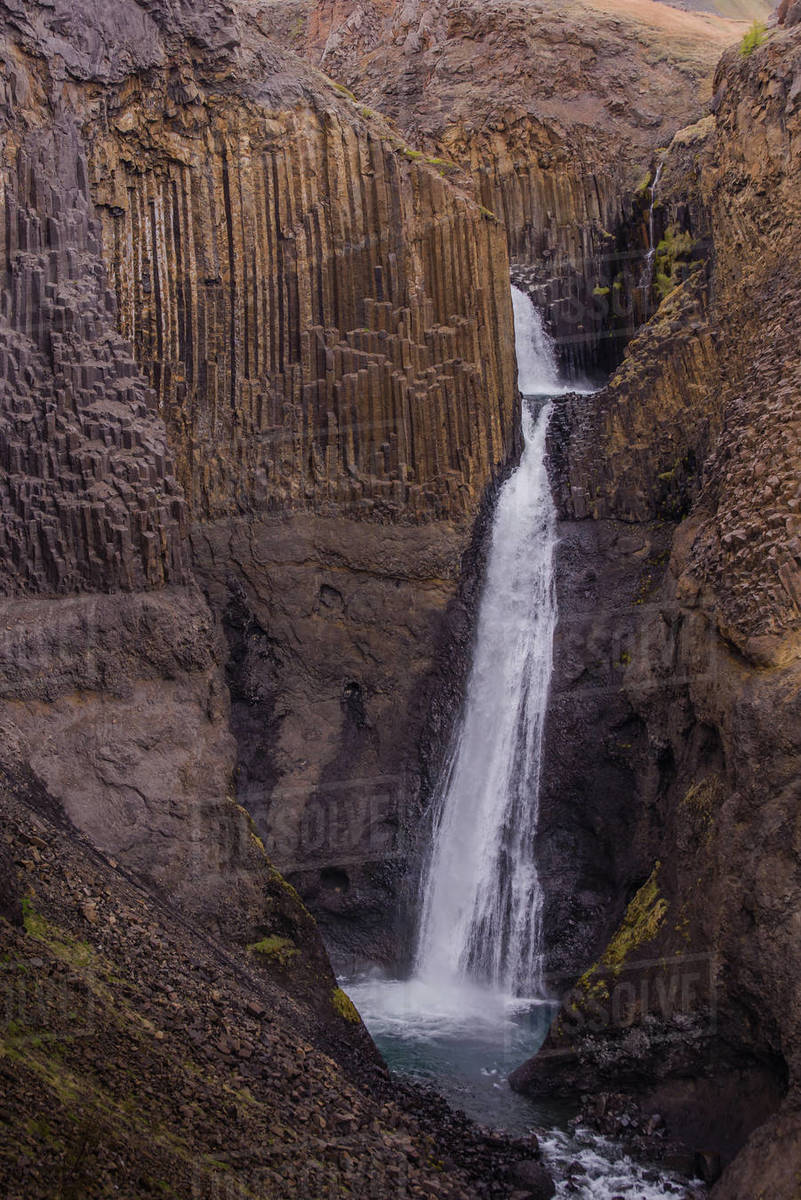View of rock formation, erosion and waterfall, Hofn, Austur ...
