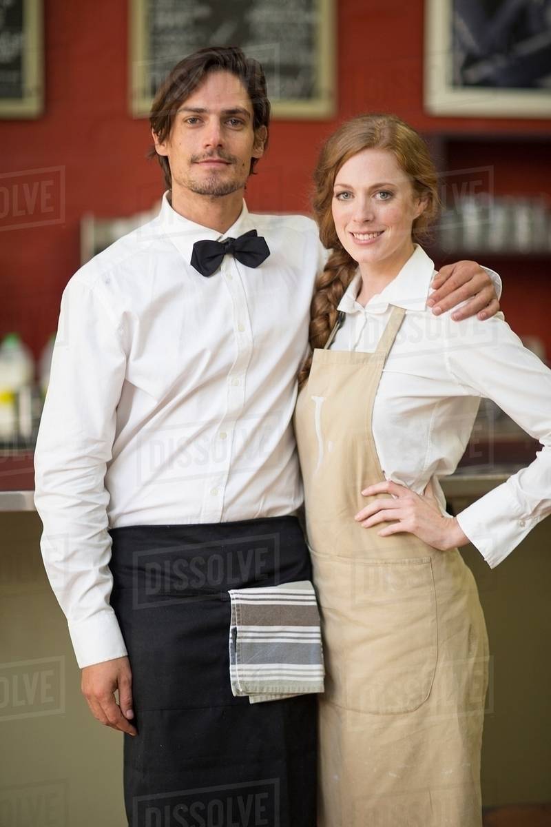 Portrait of waitress and waiter in restaurant - Royalty-free Stock ...