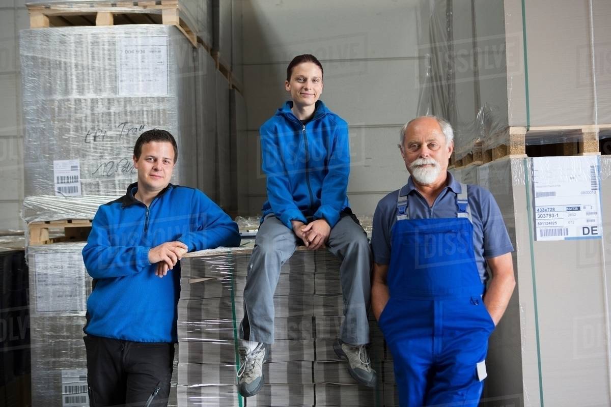 Portrait of team of factory workers - Royalty-free Stock Photo | Dissolve