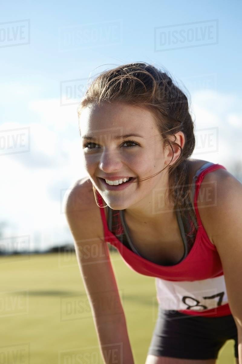 Close up of runners smiling face - Stock Photo - Dissolve
