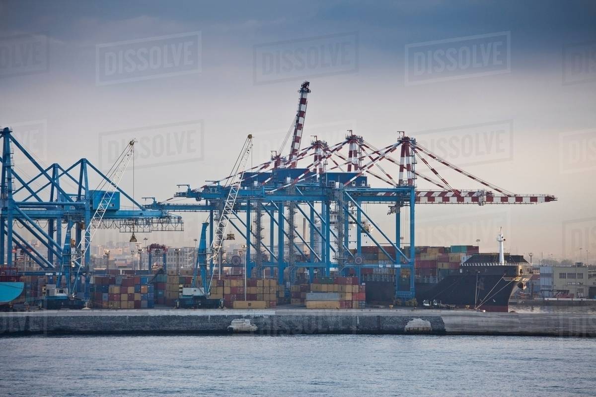 Containers in shipyard in harbor - Royalty-free Stock Photo | Dissolve