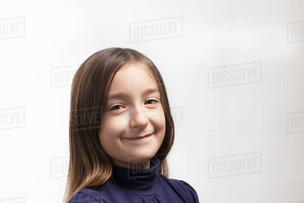 Close up of girls smiling face - Royalty-free Stock Photo | Dissolve