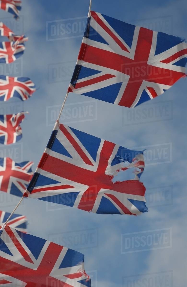 British flags flying in sky - Royalty-free Stock Photo | Dissolve