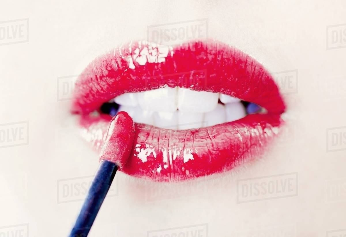 Close up of womans lips with lip gloss - Royalty-free Stock Photo ...