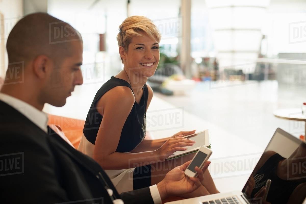 Business people using technology - Royalty-free Stock Photo | Dissolve