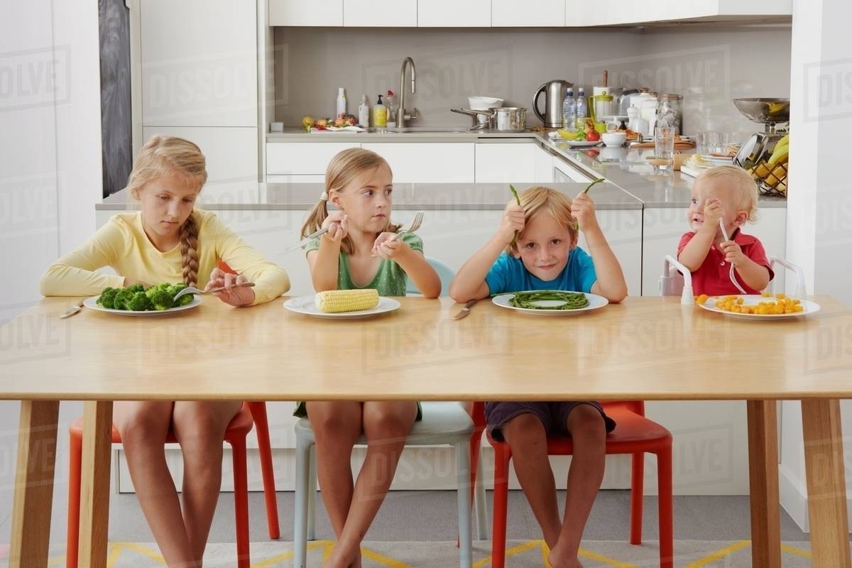Children refusing to eat vegetables - Royalty-free Stock Photo | Dissolve