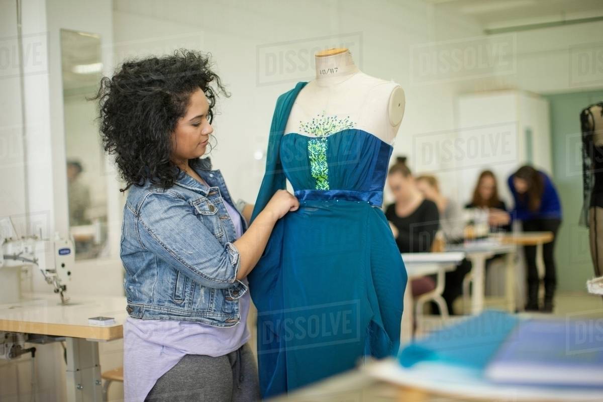 Fashion design students in class - Stock Photo - Dissolve