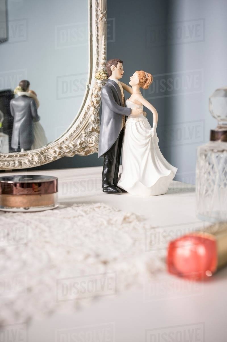 Wedding figurines on dressing table - Royalty-free Stock Photo | Dissolve