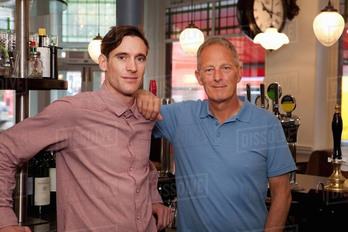 Father and son in bar - Stock Photo - Dissolve