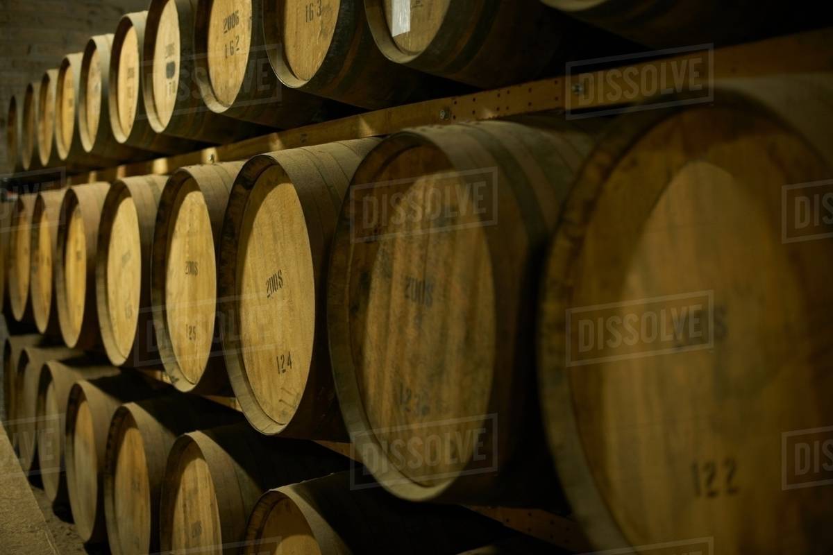 Stack of Scottish whisky barrels - Royalty-free Stock Photo | Dissolve