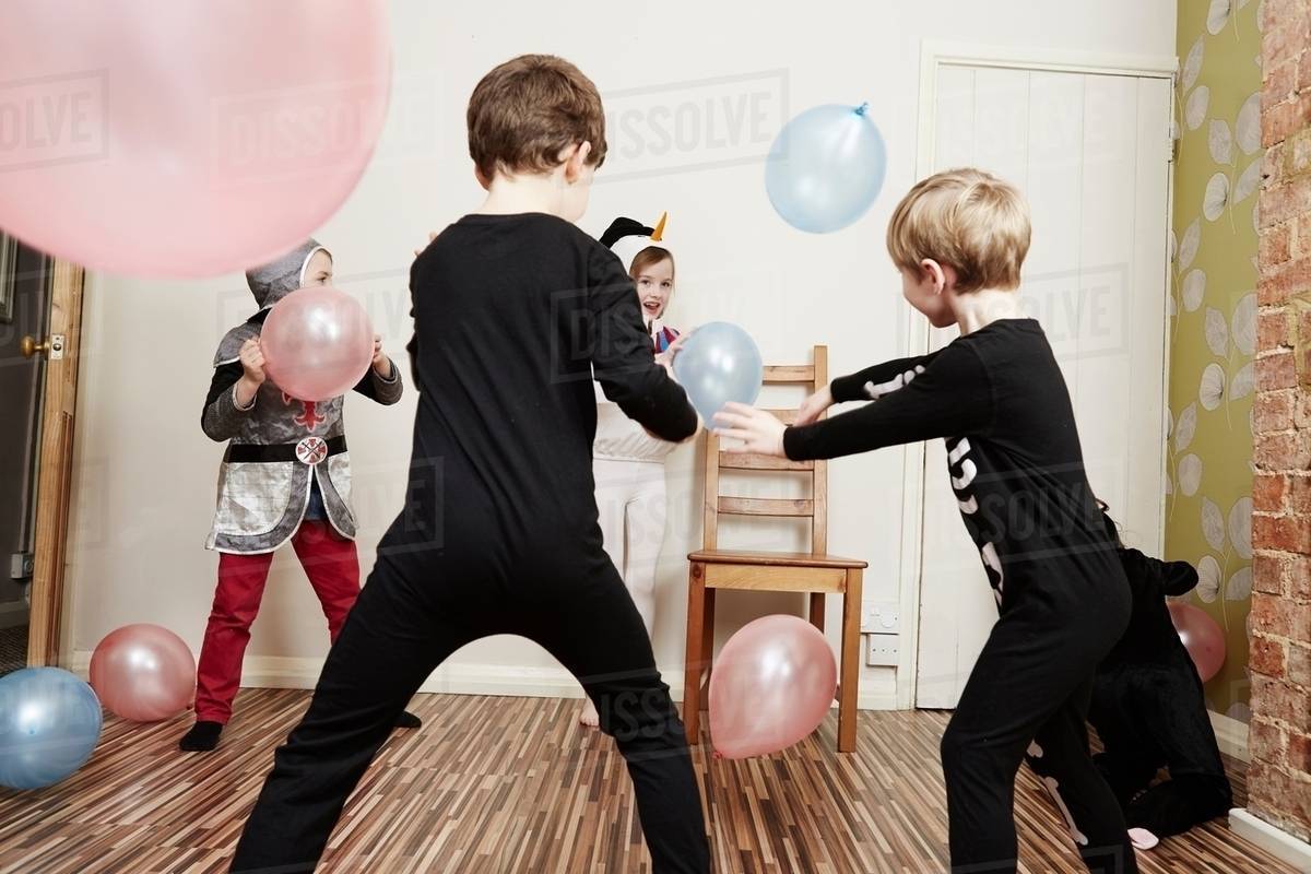 Children playing with balloons at birthday party - Royalty-free Stock ...