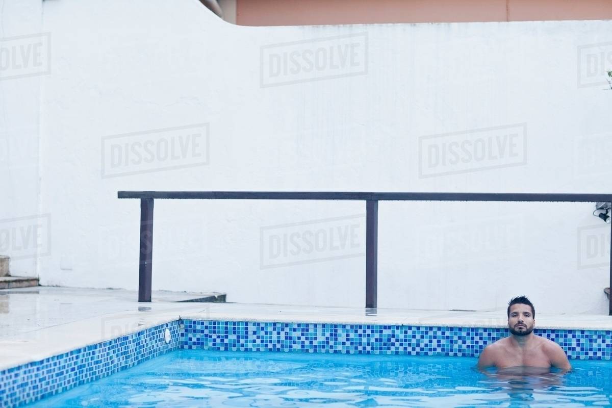 Man in pool - Royalty-free Stock Photo | Dissolve