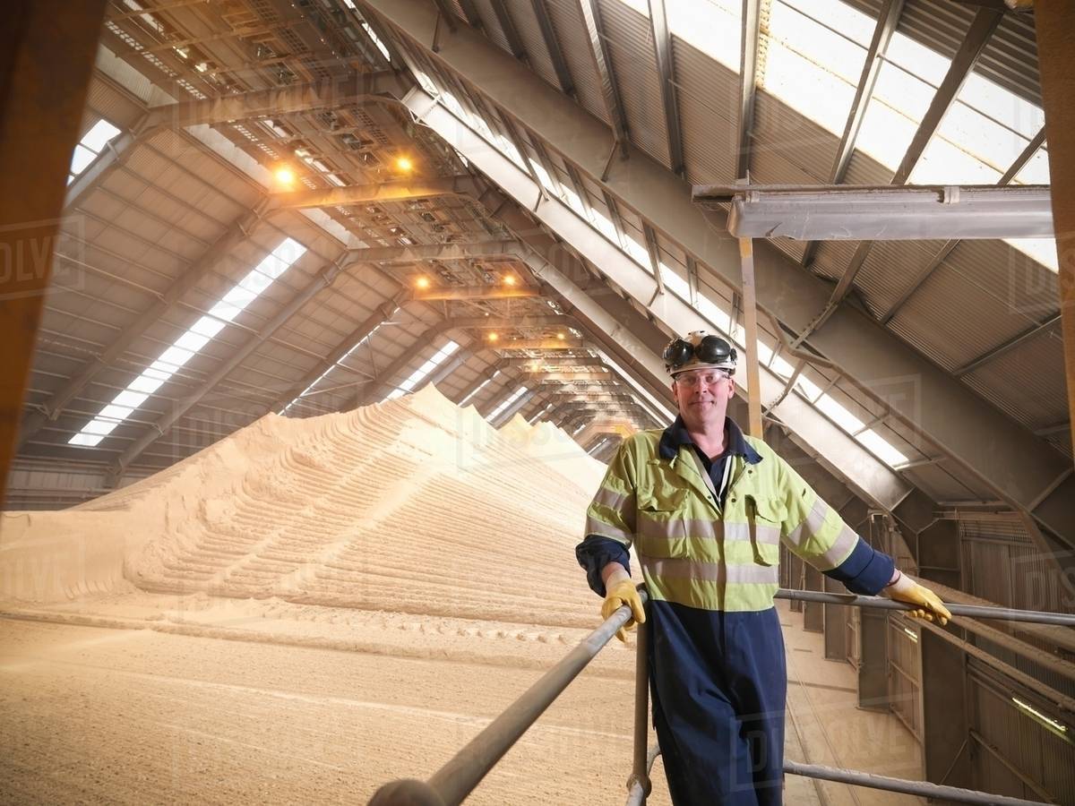 Worker at gypsum facility - Stock Photo - Dissolve
