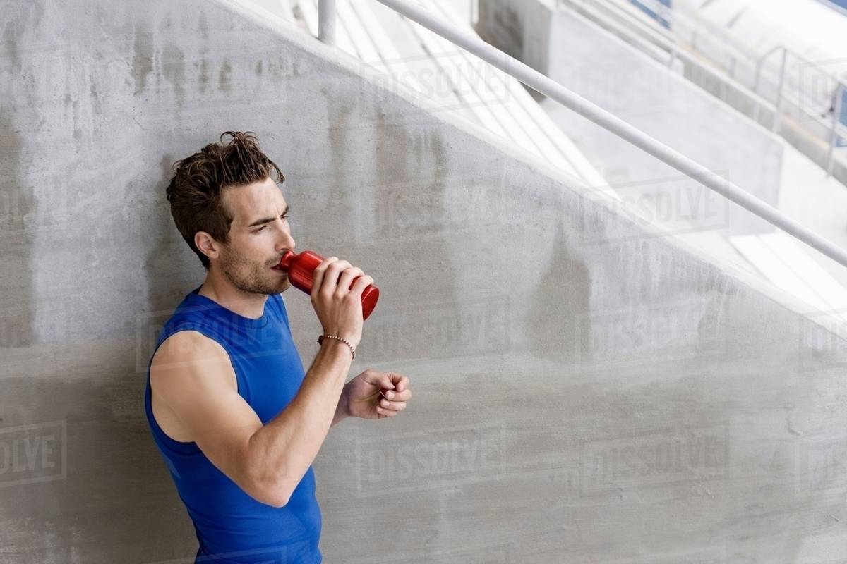 Runner drinking water - Royalty-free Stock Photo | Dissolve