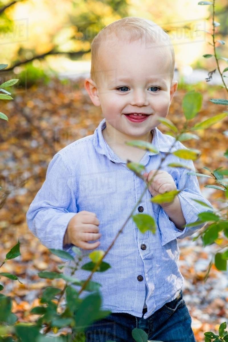 Portrait of young boy in rural setting - Royalty-free Stock Photo ...