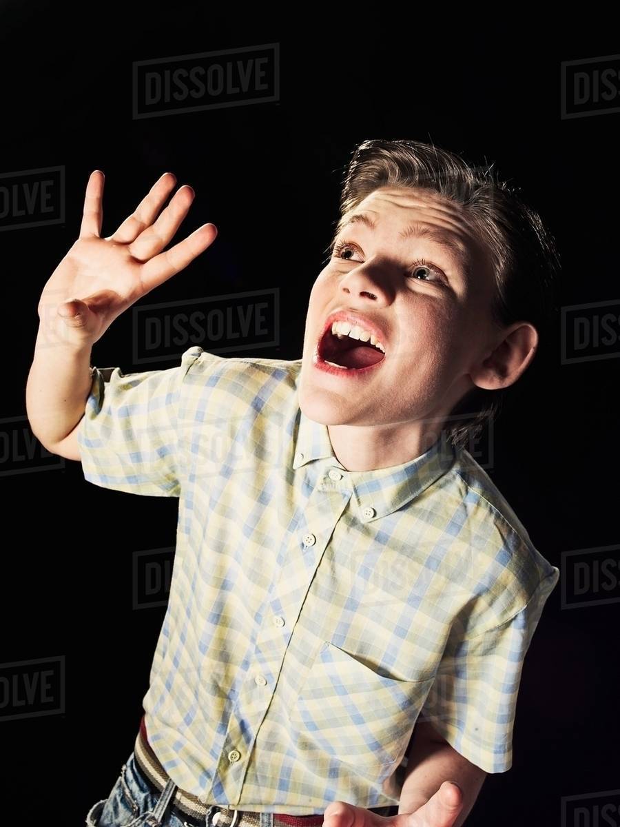 Frightened boy gasping - Royalty-free Stock Photo | Dissolve