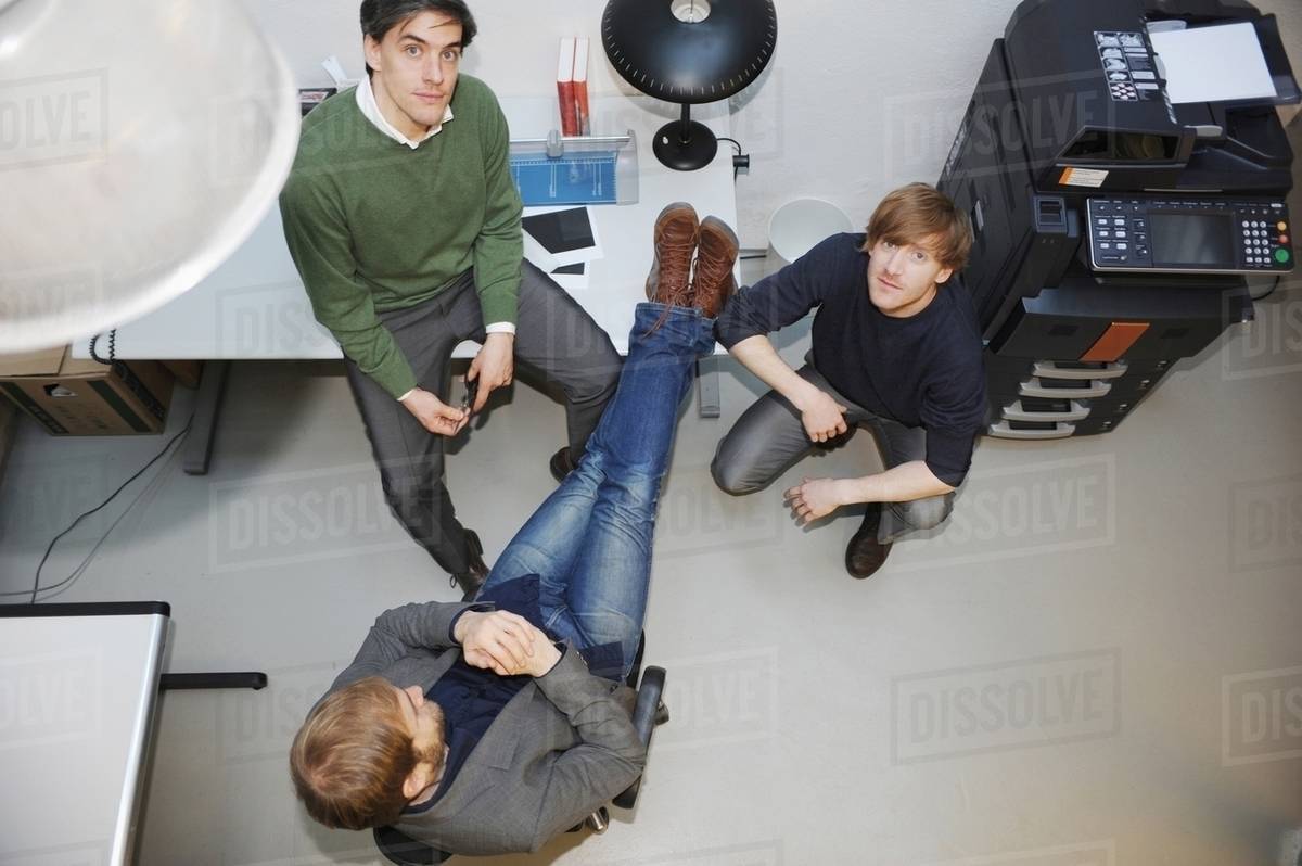 Overhead view of businessmen in office - Royalty-free Stock Photo ...