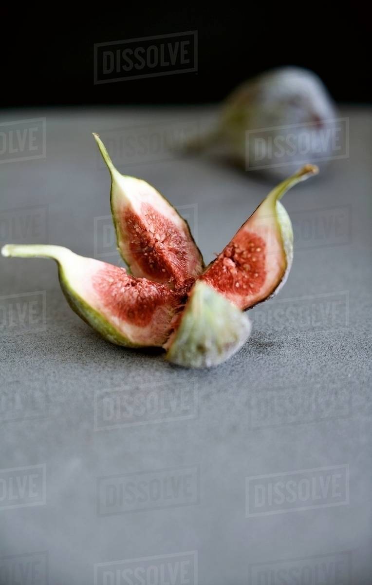 Close up of sliced fig - Royalty-free Stock Photo | Dissolve