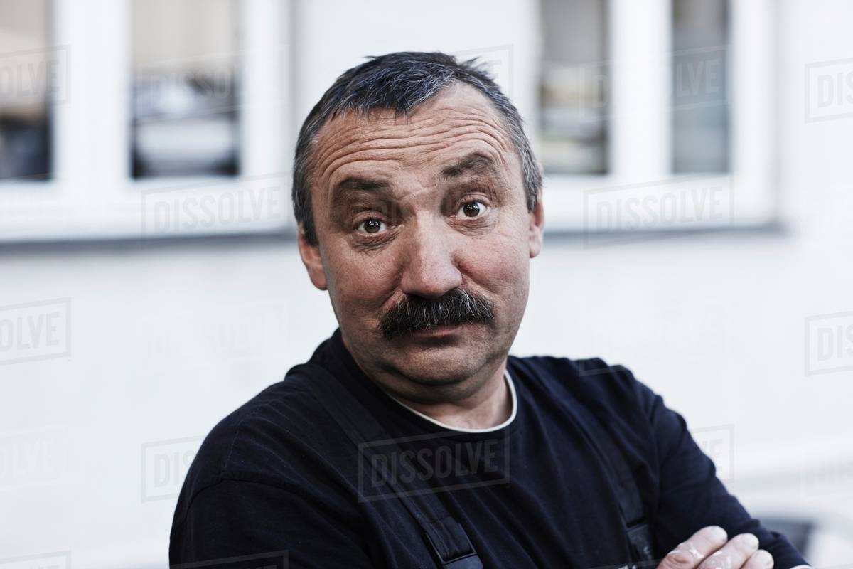 Close up of mans surprised face - Royalty-free Stock Photo | Dissolve