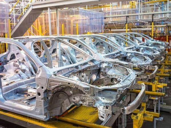 Car bodies on production line in car factory - Stock Photo - Dissolve
