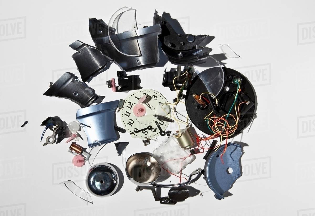 Pile of smashed clock parts - Royalty-free Stock Photo | Dissolve