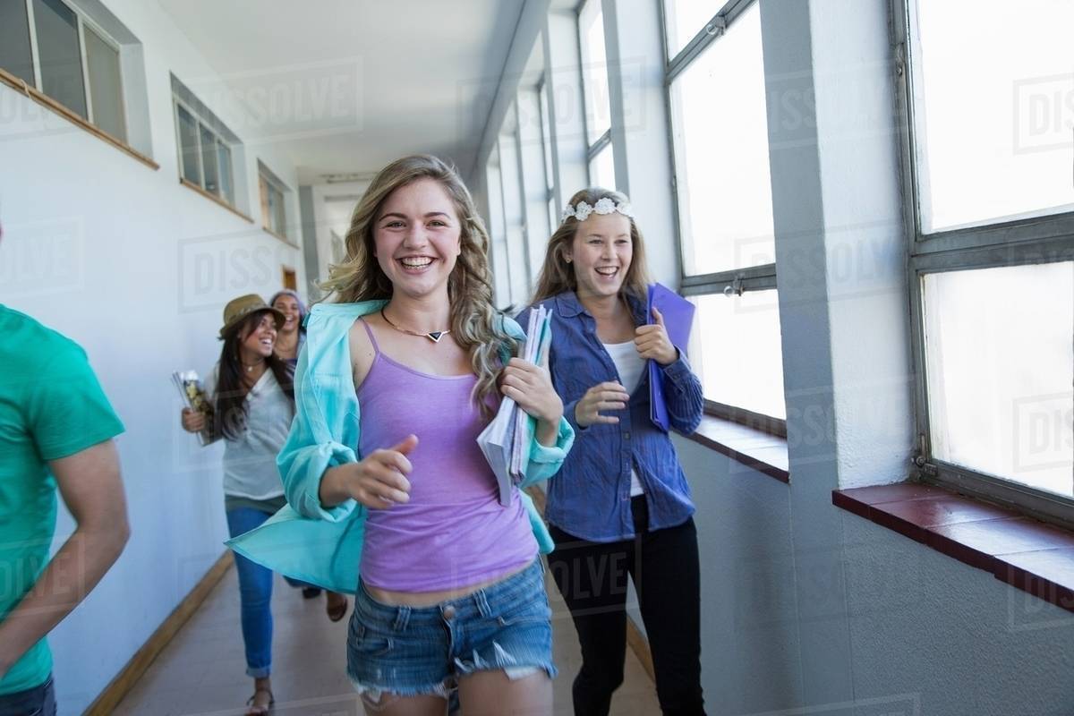 Students running down hallway, laughing - Royalty-free Stock Photo ...