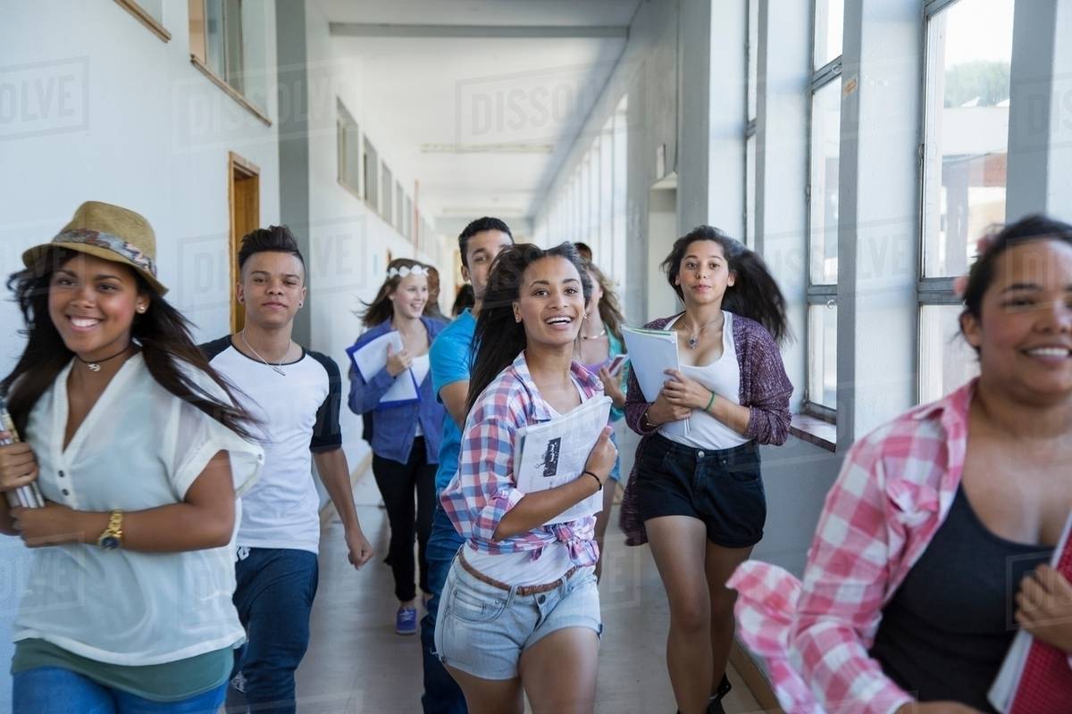 Students running down hallway, laughing - Royalty-free Stock Photo ...