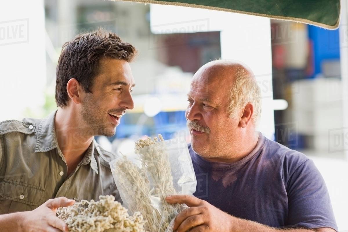 Men selling fruits - Royalty-free Stock Photo | Dissolve