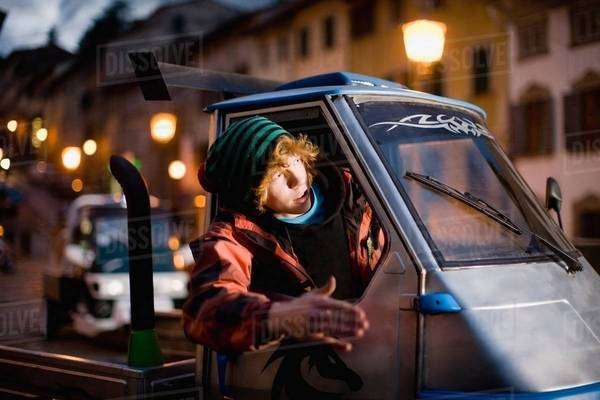 Young moped rider - Stock Photo - Dissolve