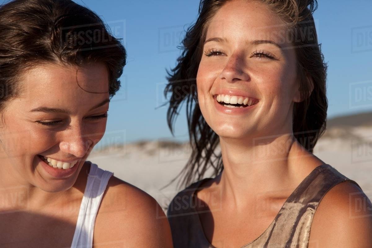 Two girls laughing - Stock Photo - Dissolve