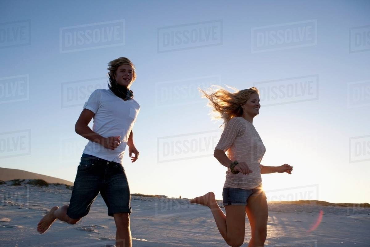 Boy and Girl running - Stock Photo - Dissolve
