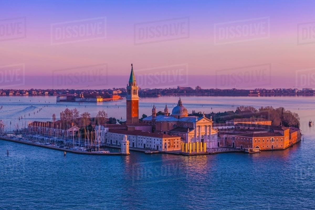 Elevated view of an island in Venetian Lagoon at sunset, Italy ...