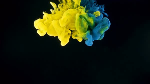 Yellow and cyan ink splash in water on black background - Stock Video ...