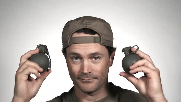 Two is better than one concept with man catching a hand grenade then ...