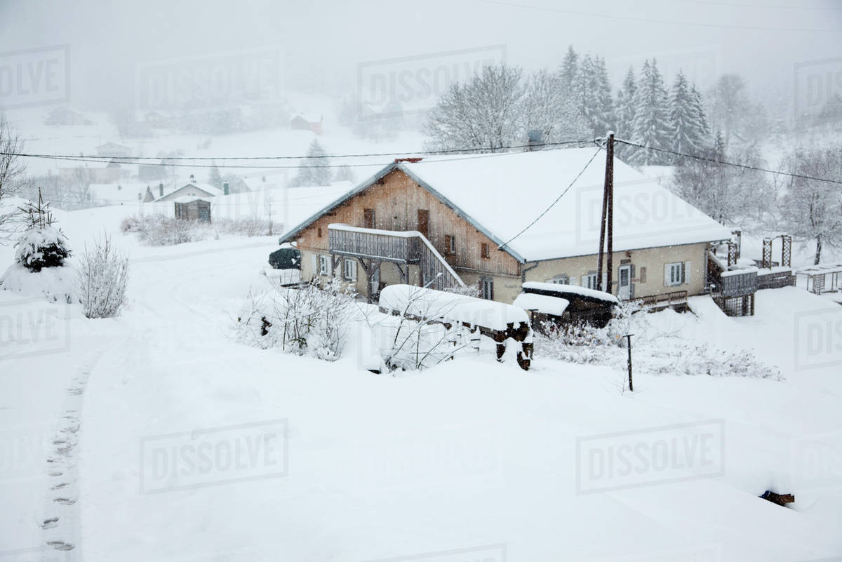 Village covered in snow - Royalty-free Stock Photo | Dissolve