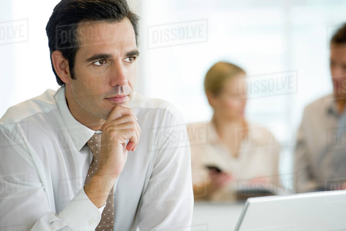 Businessman in thought - Stock Photo - Dissolve