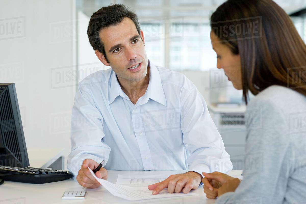 Financial advisor meeting with client - Royalty-free Stock Photo | Dissolve