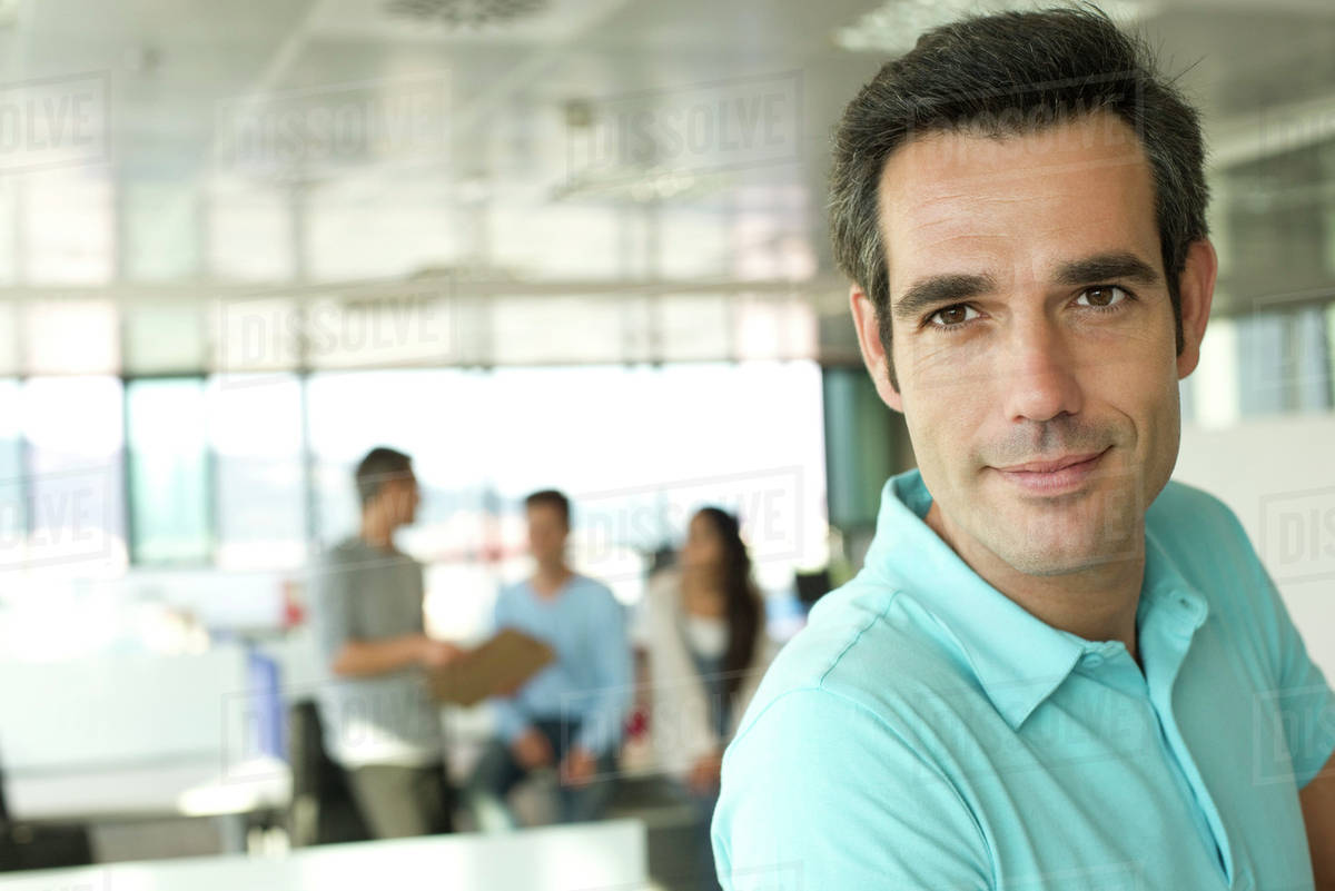 Man in office, portrait - Royalty-free Stock Photo | Dissolve