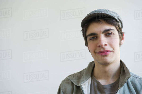 Male smiling at camera, portrait - Royalty-free Stock Photo | Dissolve