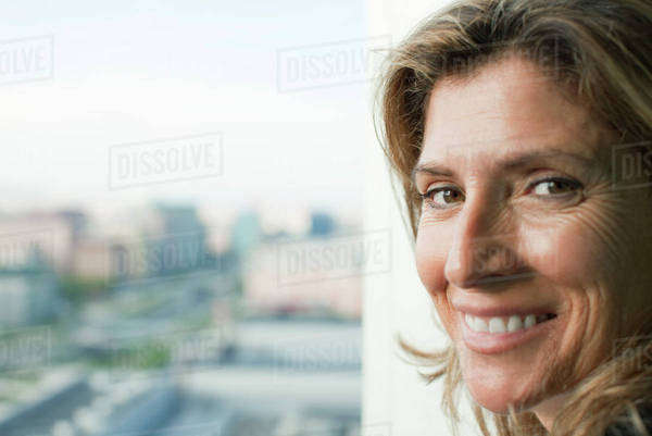 Woman smiling - Royalty-free Stock Photo | Dissolve