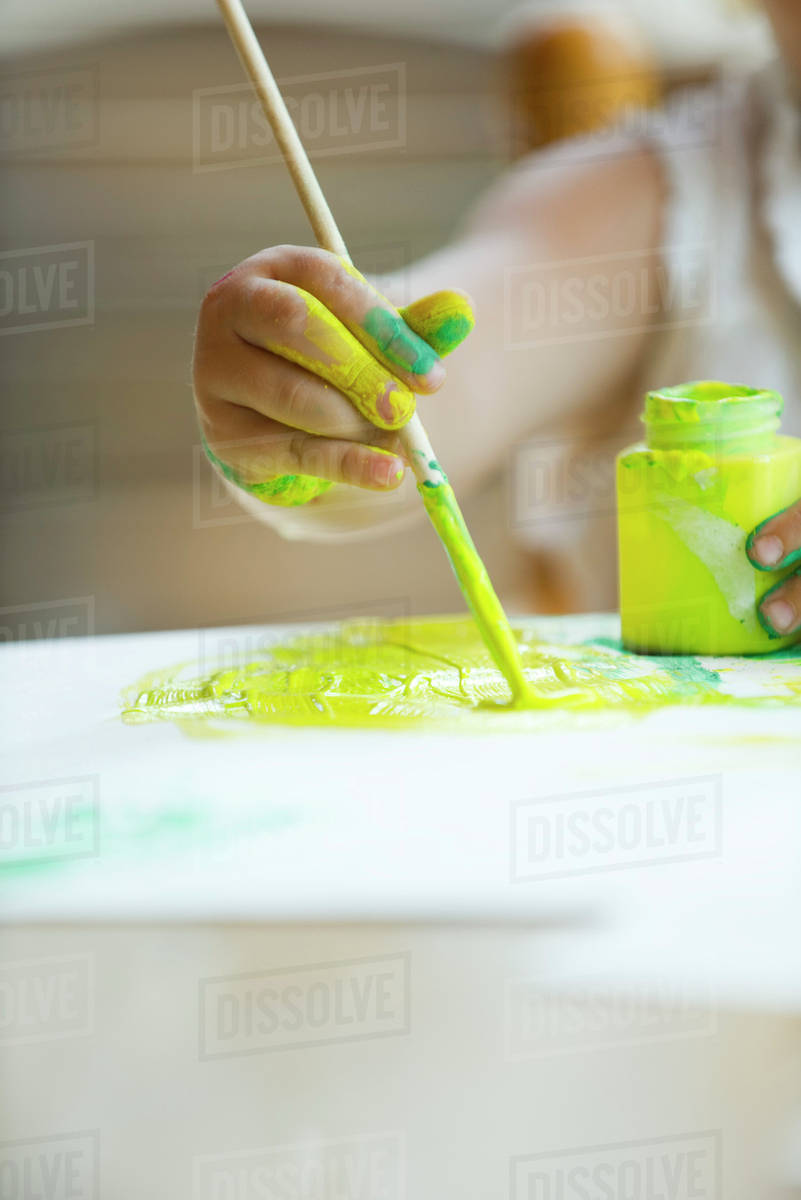 Child painting with paintbrush, cropped - Royalty-free Stock Photo ...