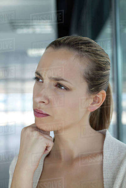 Woman with confused expression - Royalty-free Stock Photo | Dissolve