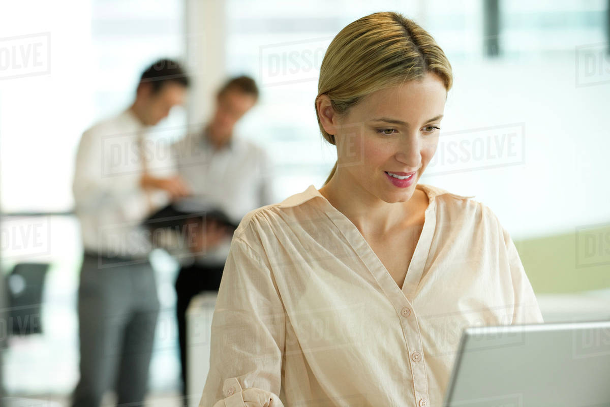 Professional woman working in office - Royalty-free Stock Photo | Dissolve
