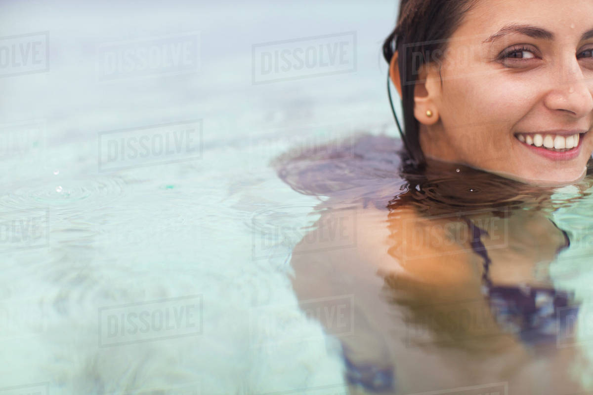 Woman swimming, portrait - Royalty-free Stock Photo | Dissolve