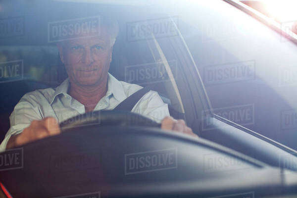 Man driving car, portrait - Royalty-free Stock Photo | Dissolve