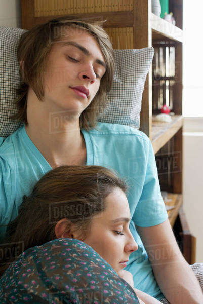 Young couple napping together - Royalty-free Stock Photo | Dissolve