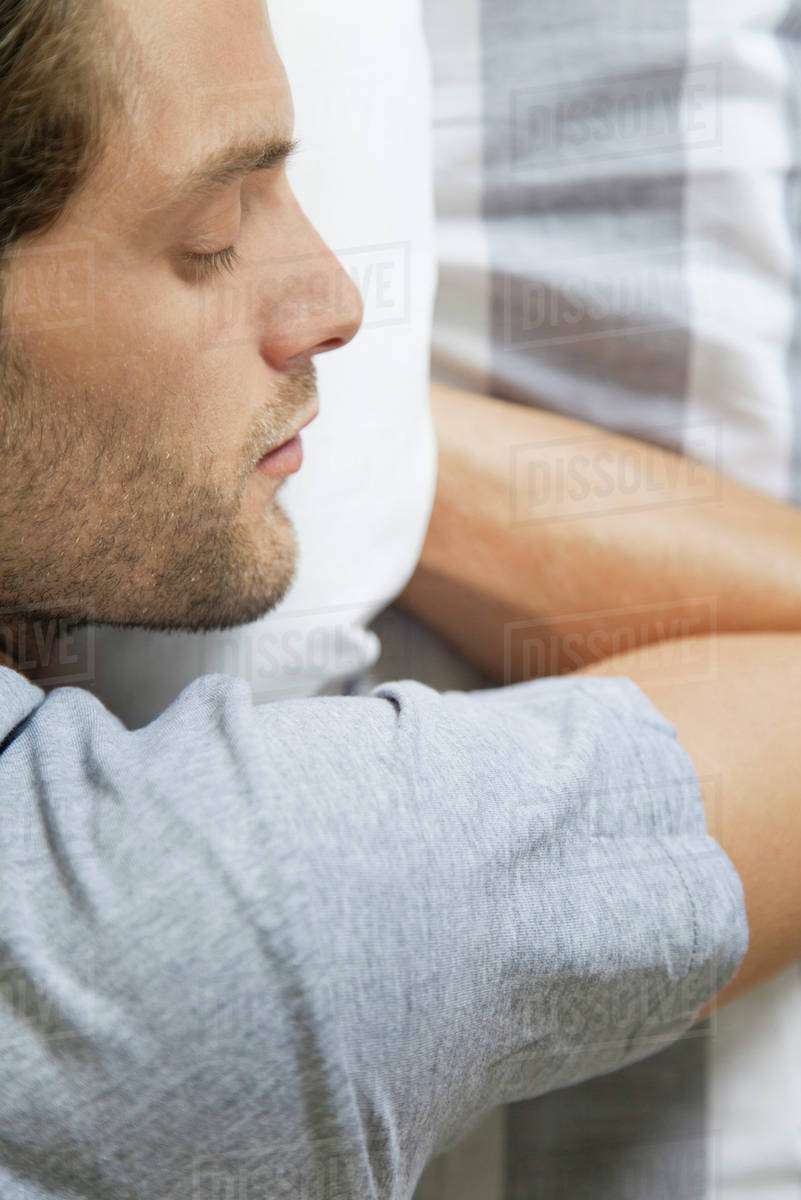 Man sleeping, high angle view - Royalty-free Stock Photo | Dissolve