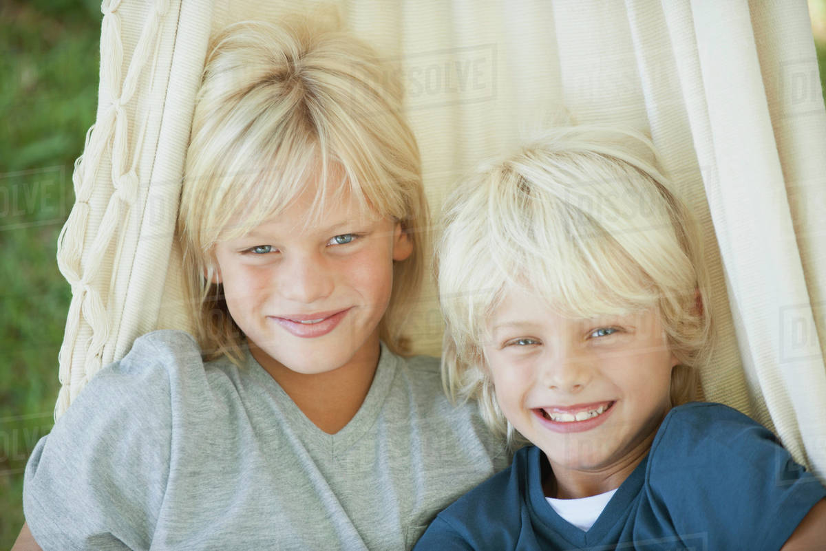 Young brothers, portrait - Royalty-free Stock Photo | Dissolve